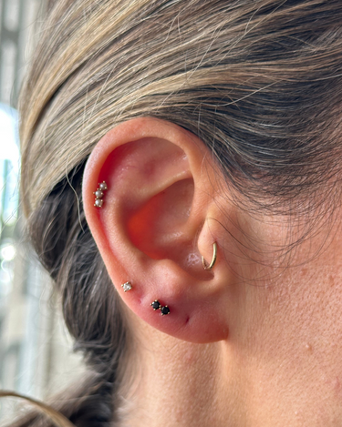 Tragus Piercing Guide | Pain, Healing, Jewellery & Styling Tips – covetear