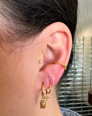 Tragus Piercing Guide | Pain, Healing, Jewellery & Styling Tips – covetear
